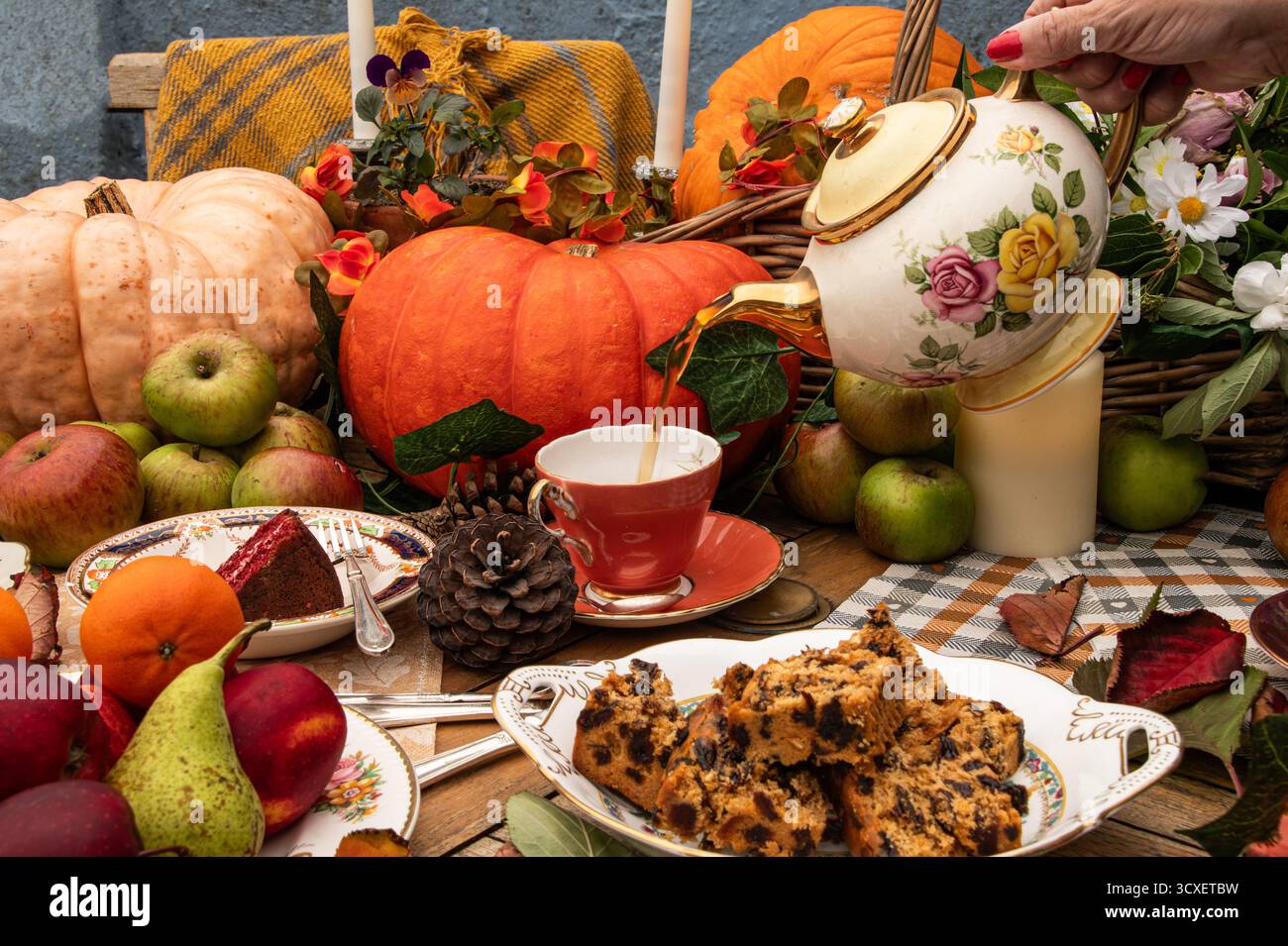 Autumn Afternoon Tea in the Garden with Pumpkins, Leaves, and Vintage A ...