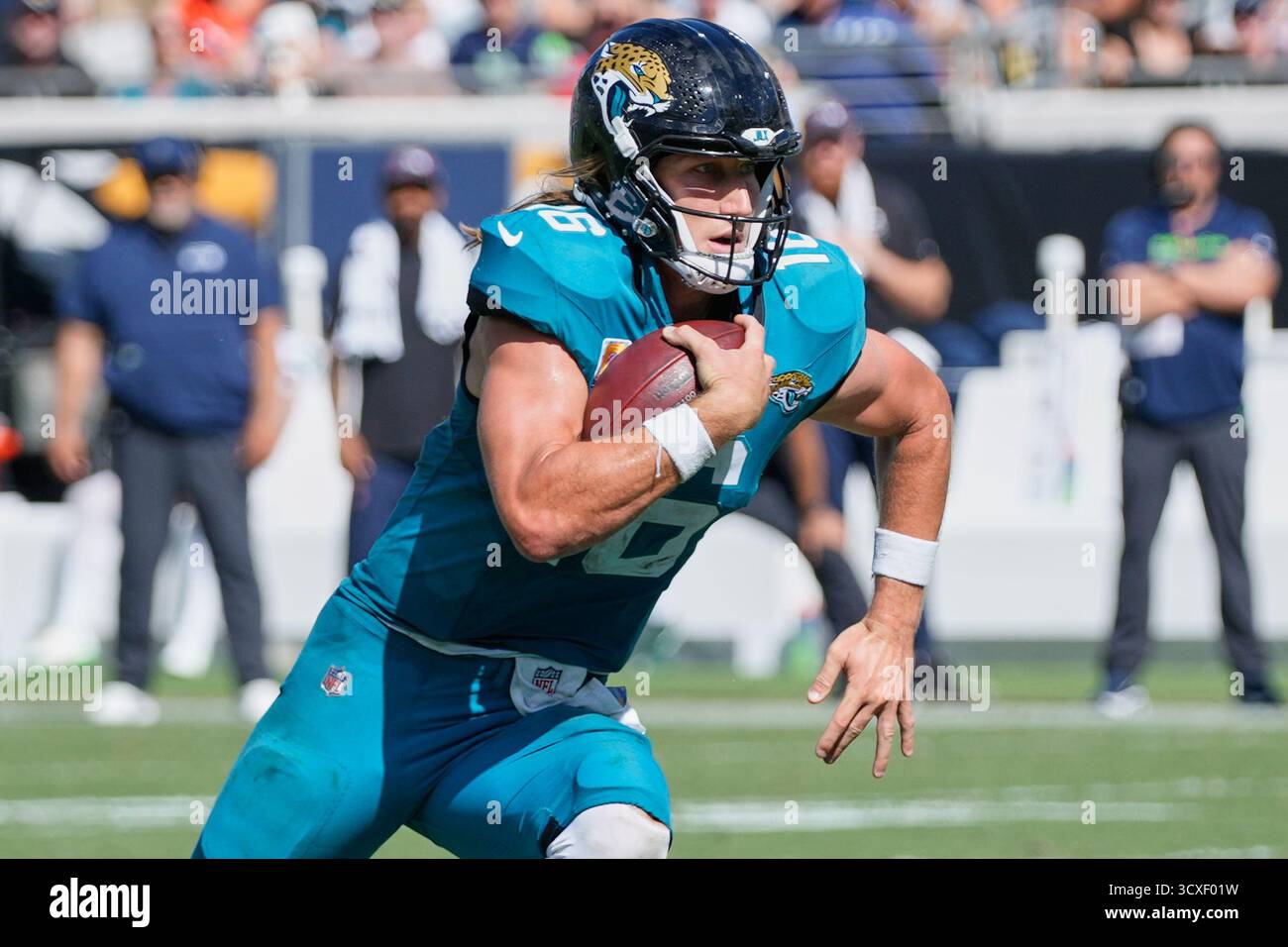 Jacksonville Jaguars quarterback Trevor Lawrence runs against the ...