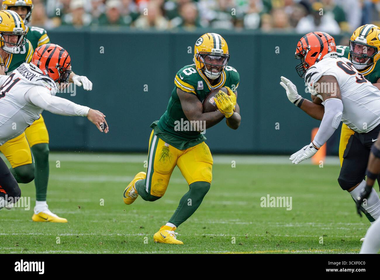Green Bay Packers running back Josh Jacobs (8) rushes during an NFL ...