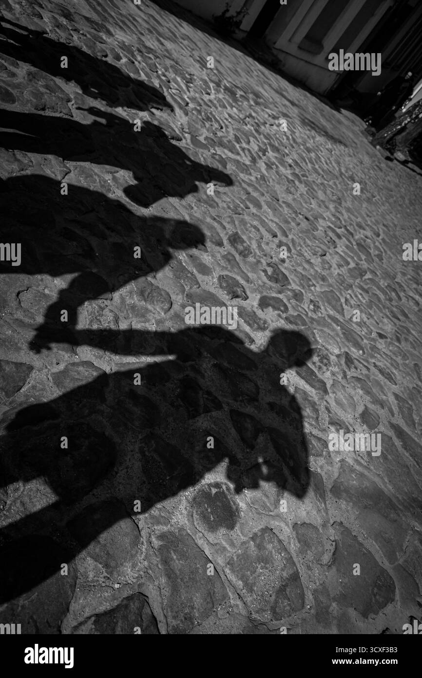 Man men walking shadow shadows silhouette hi-res stock photography and ...