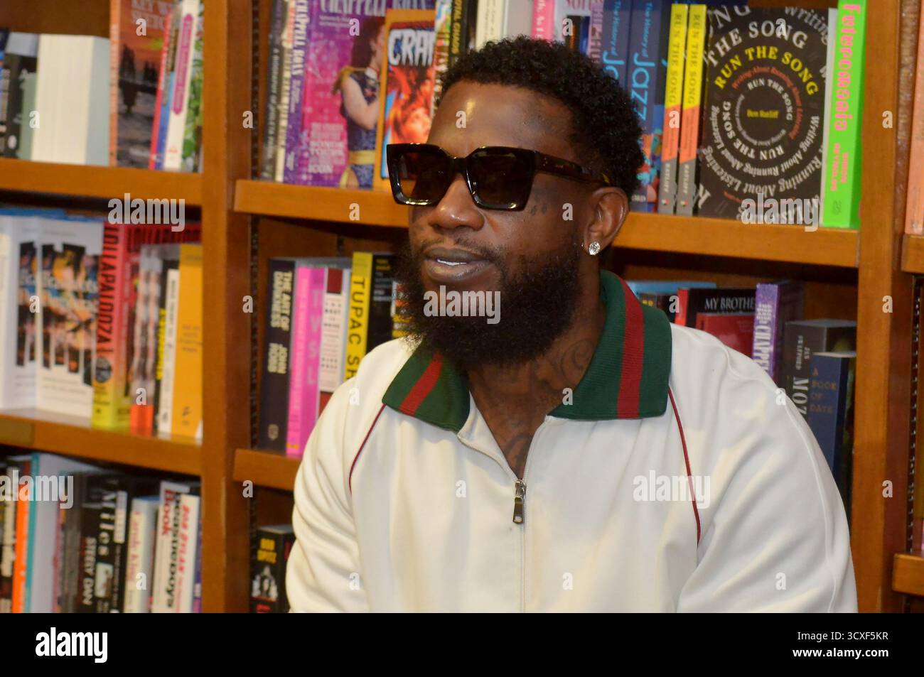 Miami, Florida, USA. 13th Oct, 2025. Rapper/author Gucci Mane sign ...
