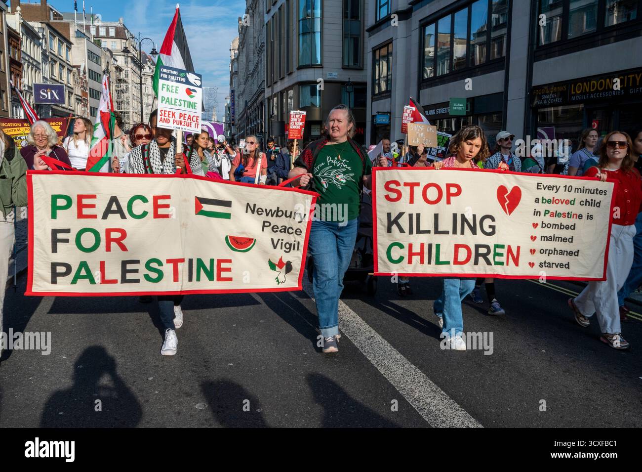 National demonstration for Palestine, London. Protesters carrying large ...