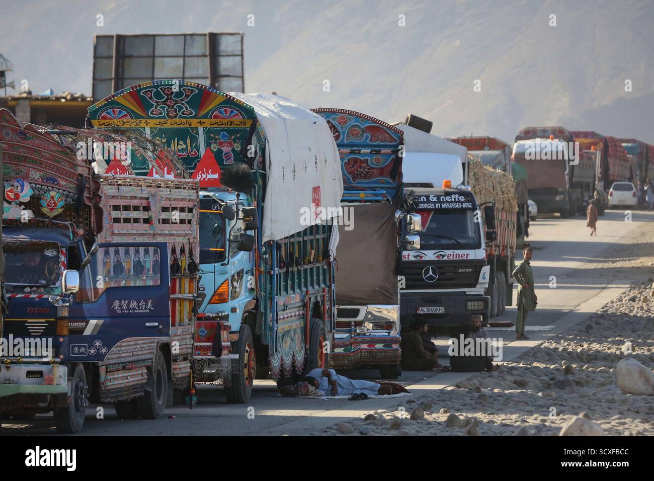 A line of cargo trucks bound for Pakistan is stranded on the Afghan ...