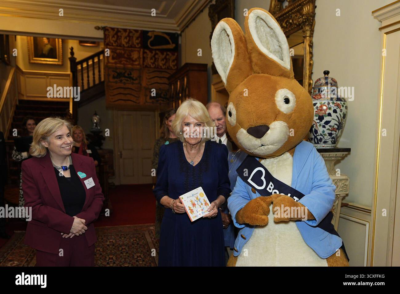 Queen Camilla with Diana Gerald and Peter Rabbit during a reception to ...