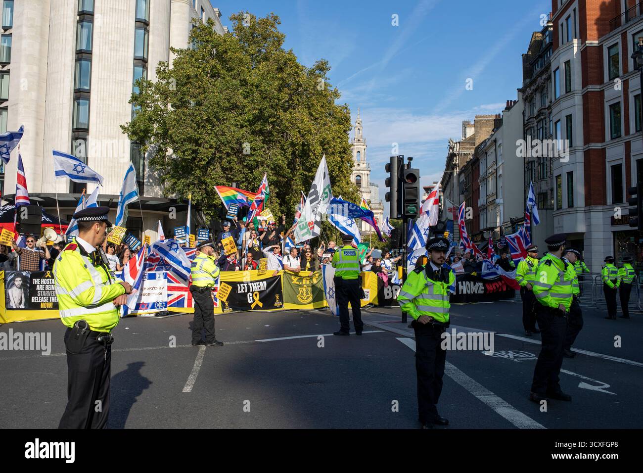 LONDON, UK. 11th October, 2025. Met police officers protecting a small ...