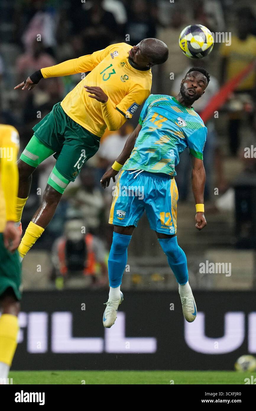 South Africa's Evidence Makgopa, left, and Rwanda's Gilbert Mugisha ...