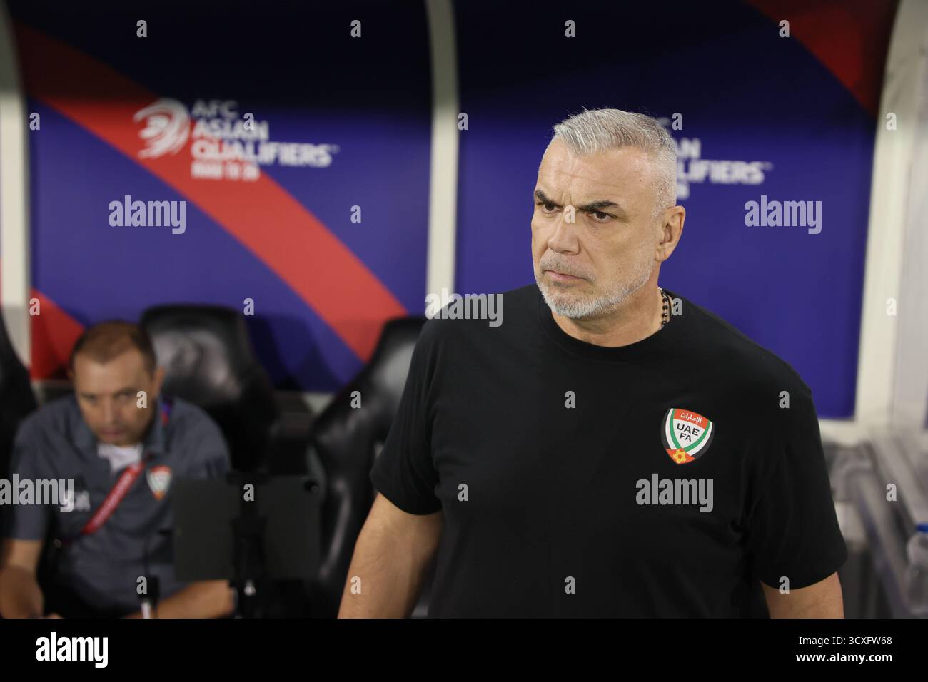 Coach of United Arab Emirates Aurelian Olaroiu is seen before the 2026 ...