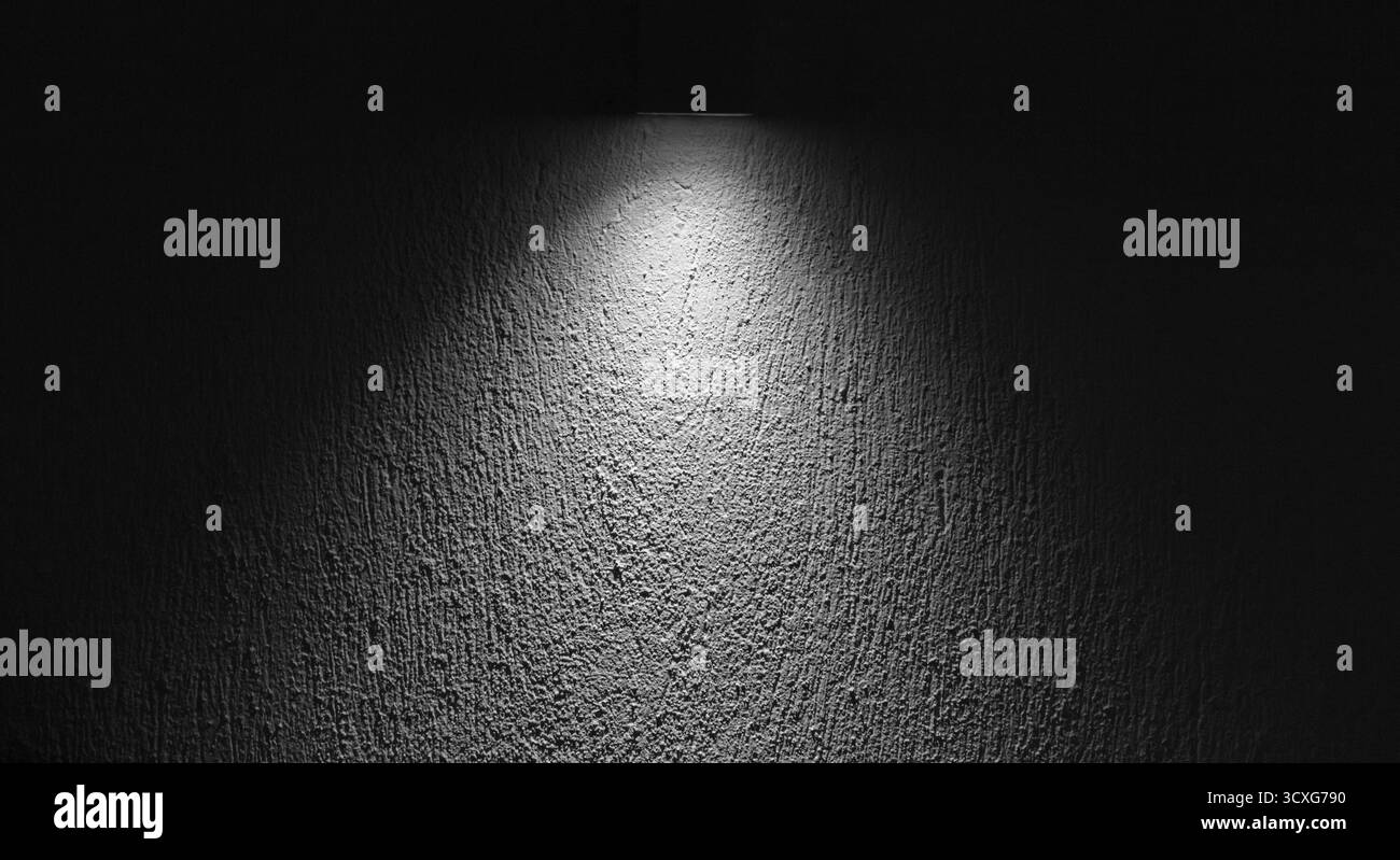 Blank black wall lit Black and White Stock Photos & Images - Alamy