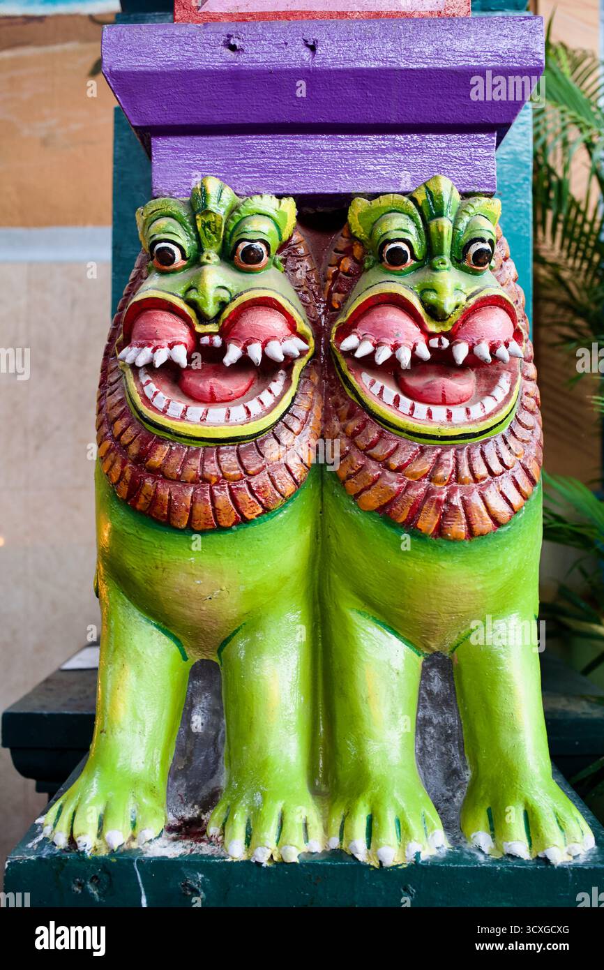 Painted twin yali (vyala) guardian figures carved as column brackets at ...