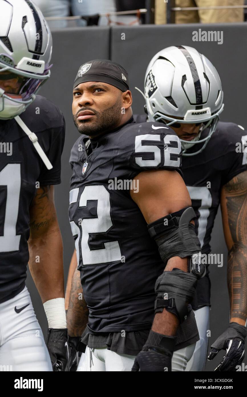 Las Vegas Raiders linebacker Elandon Roberts (52) enters the field ...