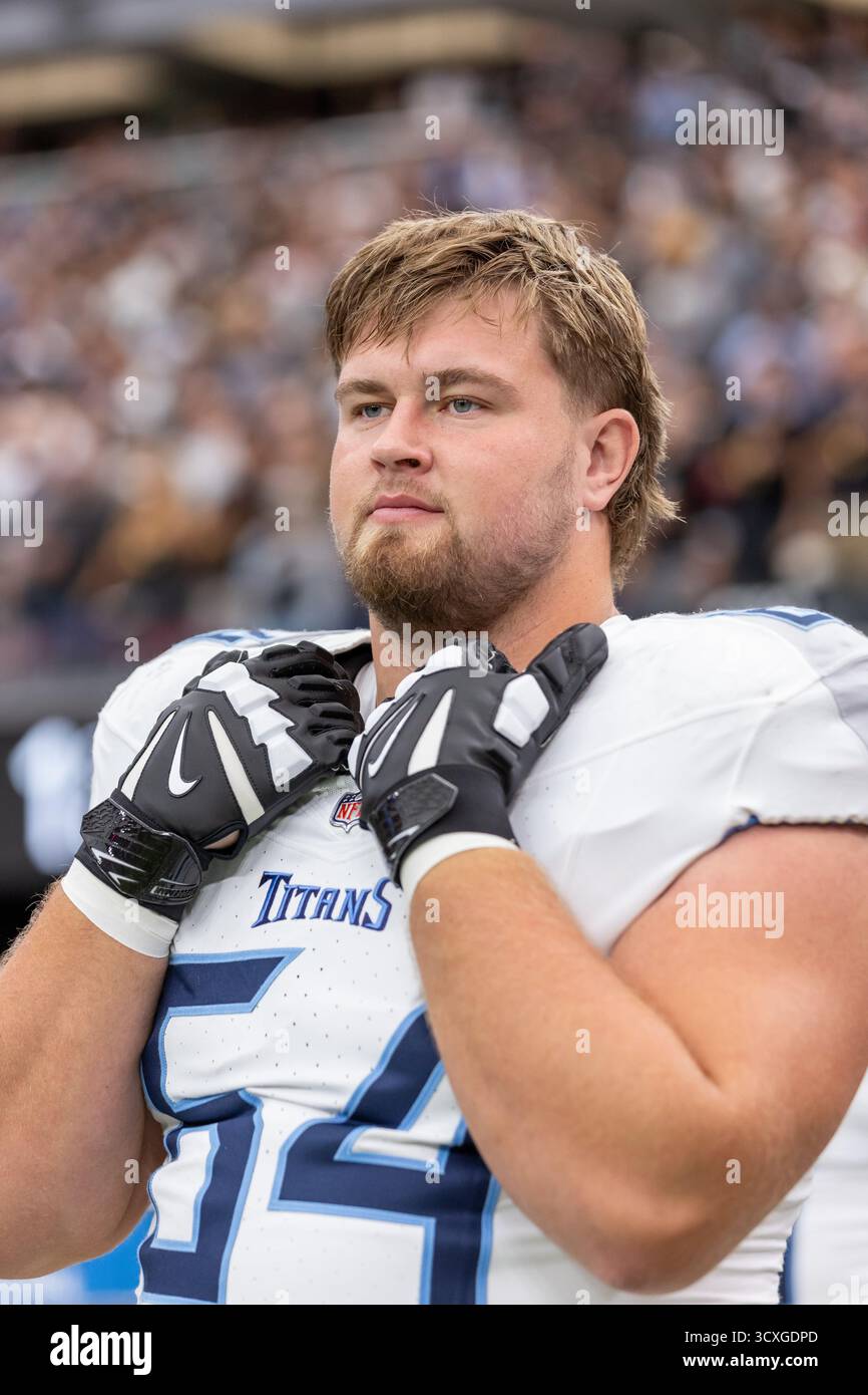 Tennessee Titans guard Jackson Slater (64) stands for the national ...