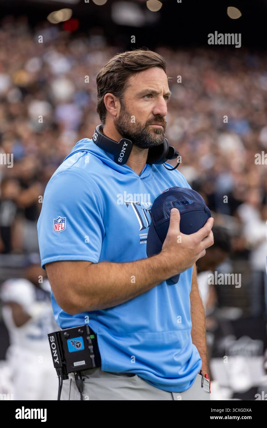 Tennessee Titans tight ends coach Luke Stocker stands for the national ...