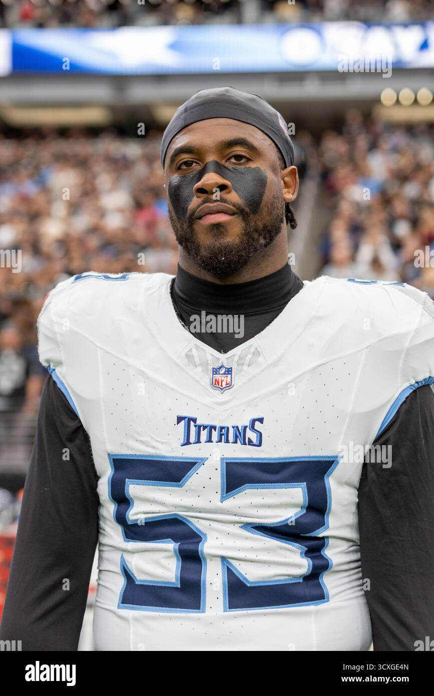 Tennessee Titans linebacker Jihad Ward (53) stands for the national ...