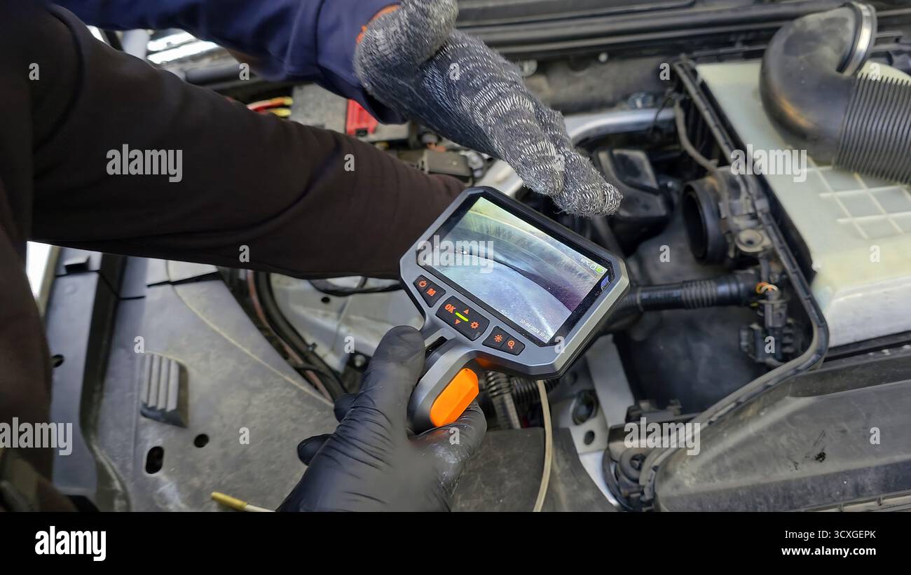 Using borescope inspection camera hi-res stock photography and images ...