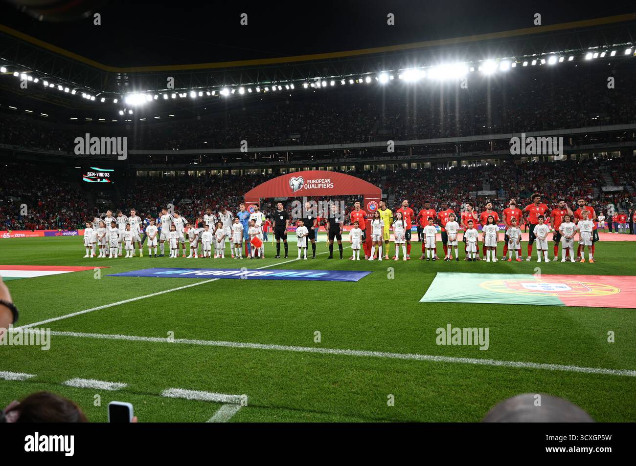 Lisbon, Portugal. 14 October 2025. Players of Portugal and Hungary line ...