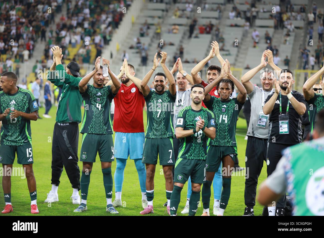 Algeria soccer team celebrates after beating Uganda in the World Cup ...