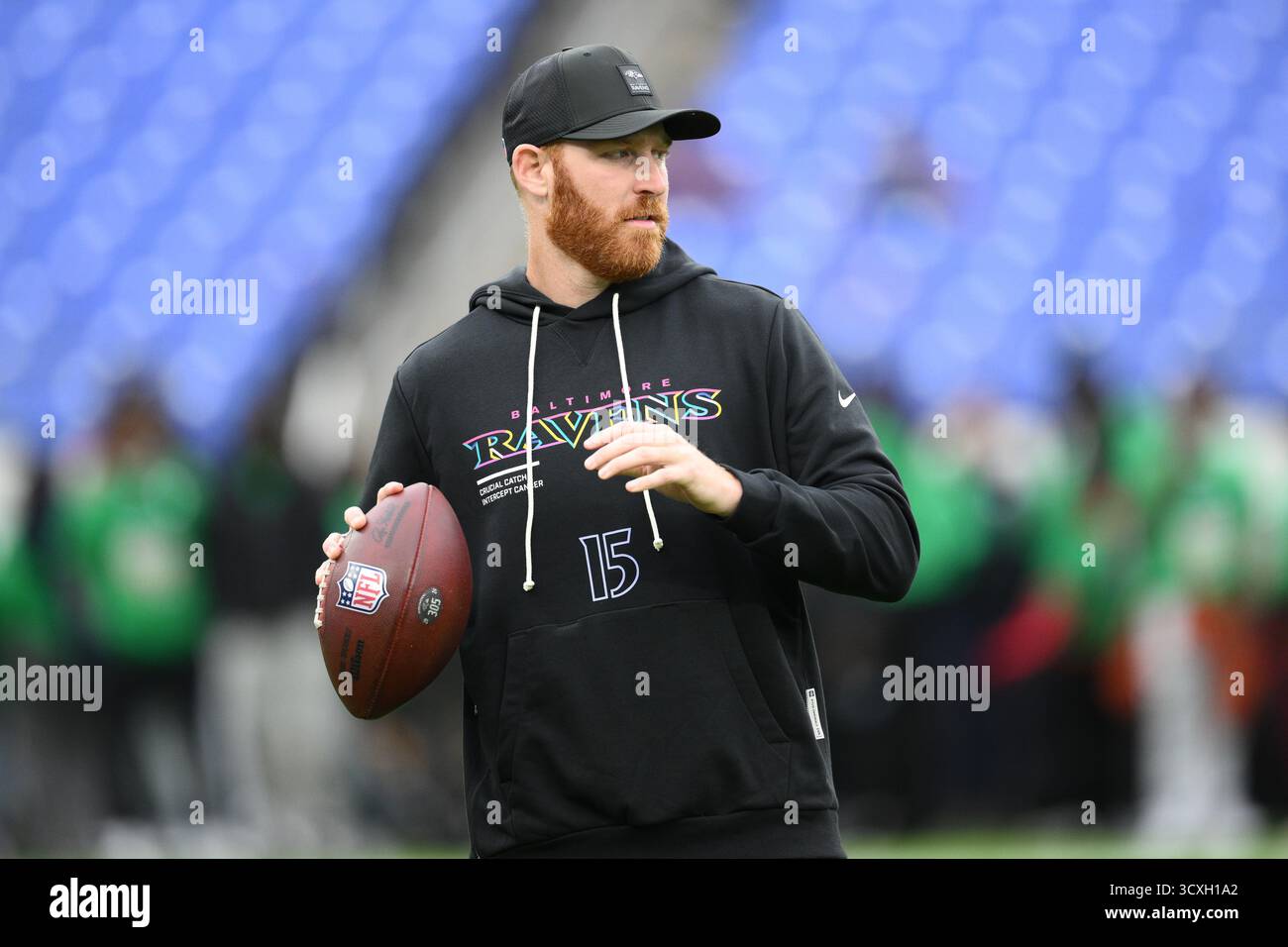 Baltimore Ravens quarterback Cooper Rush (15) warms up before an NFL ...