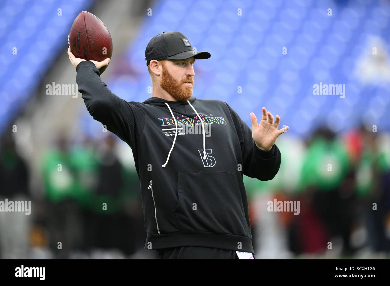 Baltimore Ravens quarterback Cooper Rush (15) warms up before an NFL ...