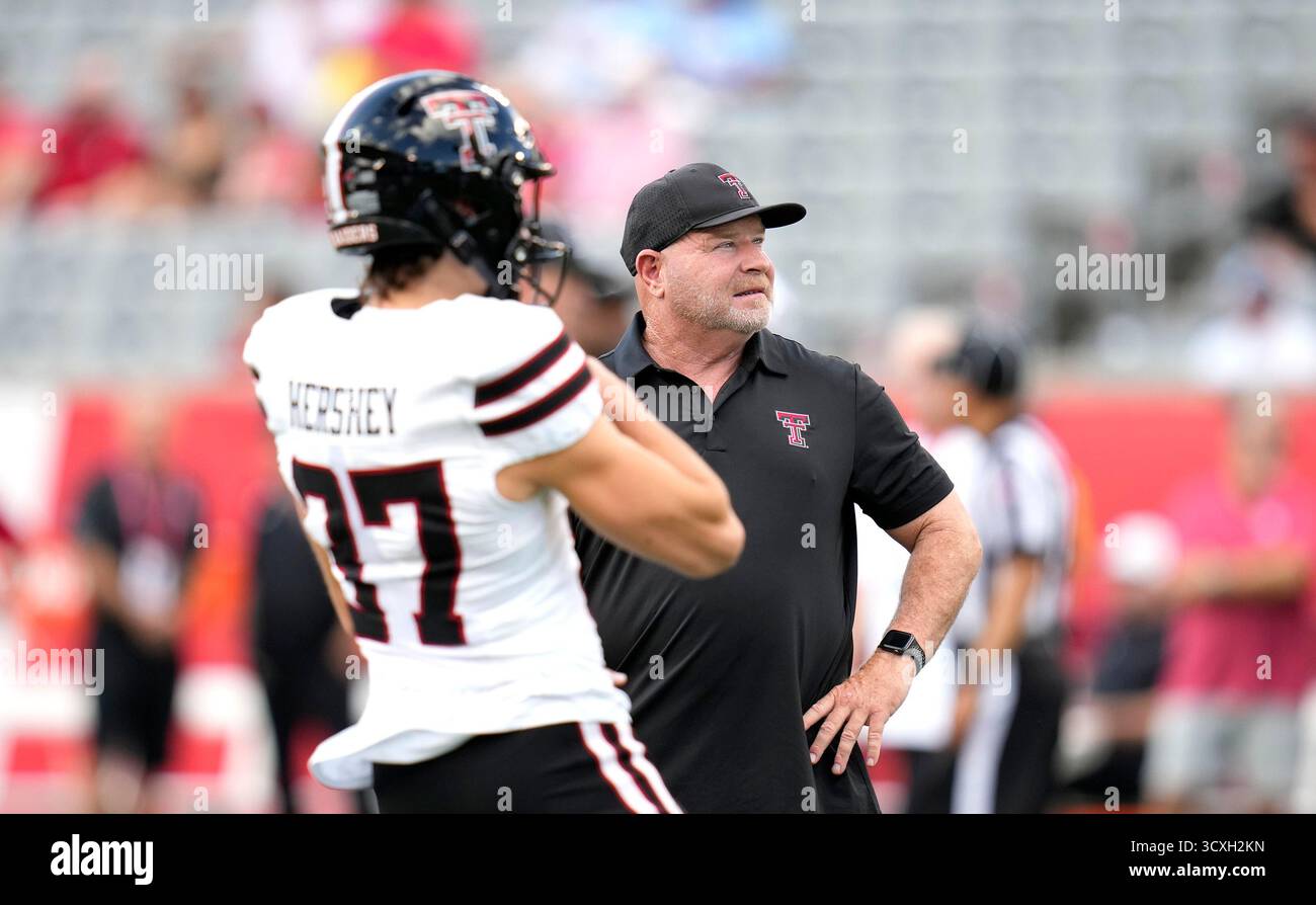Texas Tech Special Teams Coordinator Kenny Perry watches warmups before ...