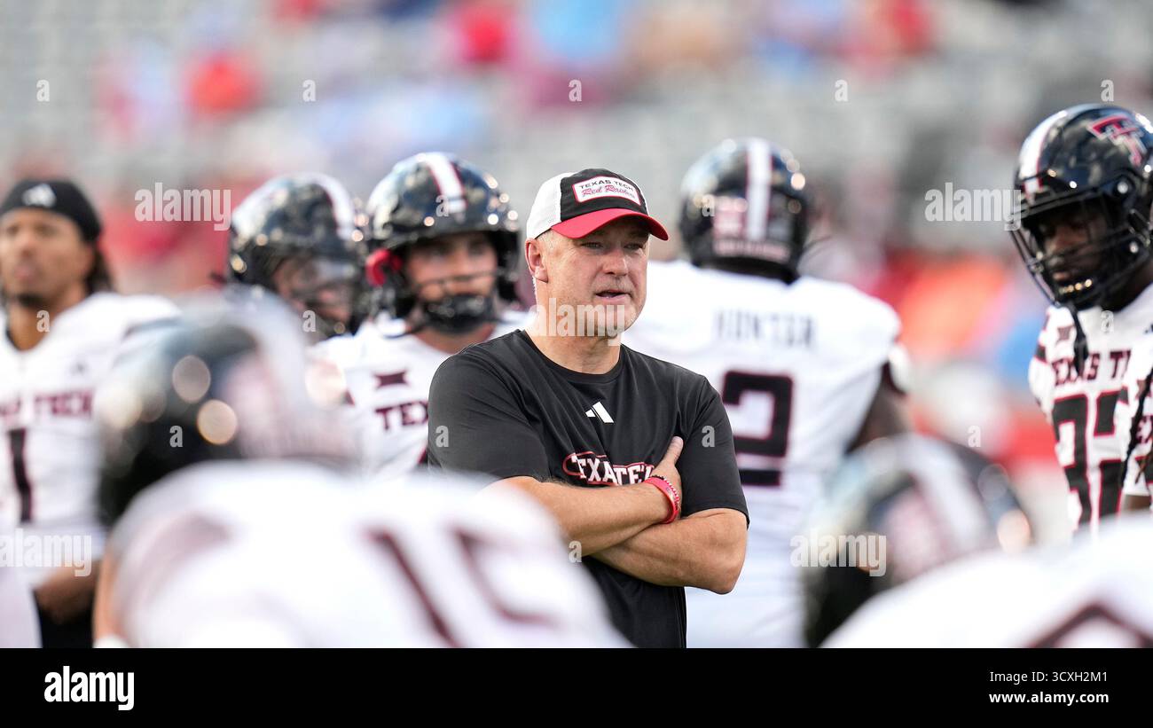 Texas Tech head coach Joey McGuire watches warmups before an NCAA ...