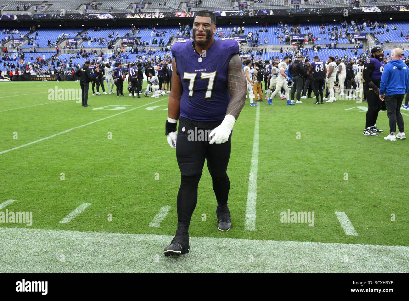 Baltimore Ravens guard Daniel Faalele (77) after an NFL football game ...