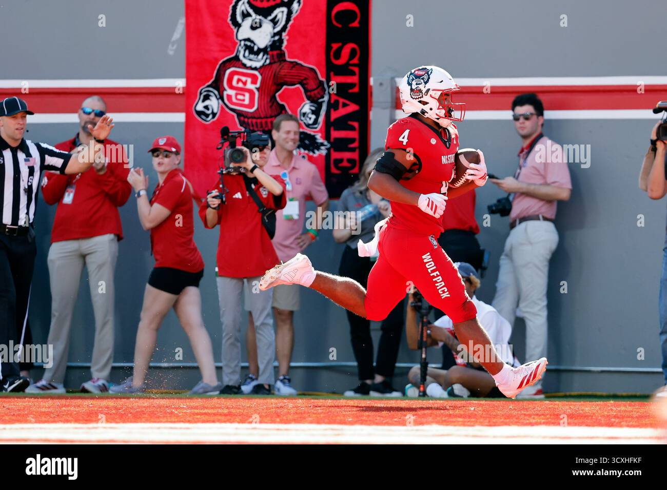 North Carolina State's Jayden Scott (4) scores a touchdown against ...