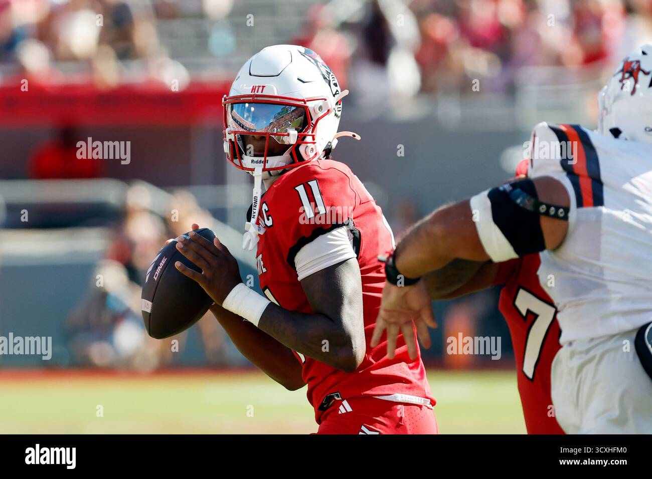 North Carolina State quarterback CJ Bailey (11) prepares to throw the ...