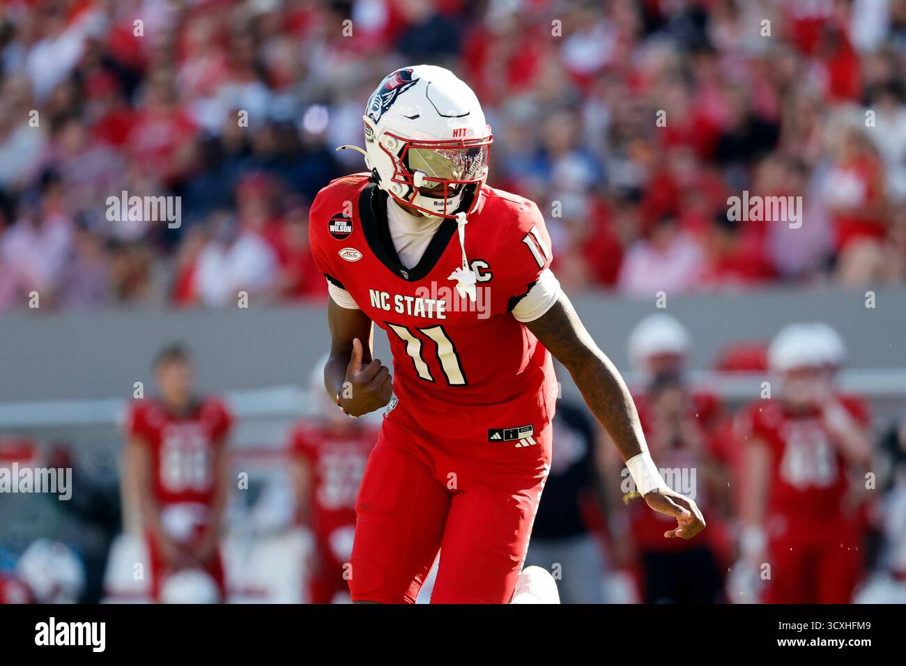 North Carolina State quarterback CJ Bailey (11) runs against Campbell ...