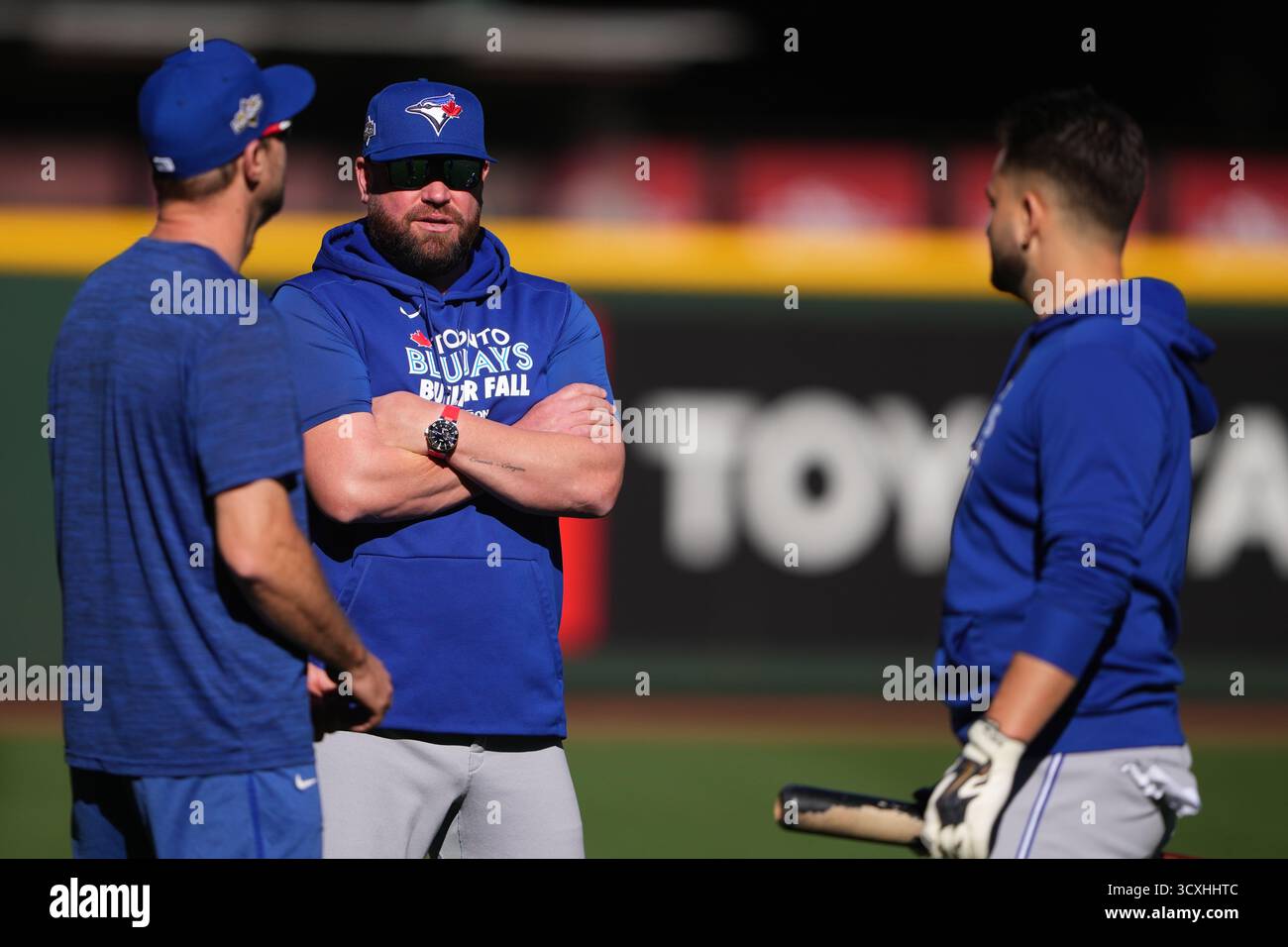 Toronto Blue Jays manager John Schneider, center, looks on during ...