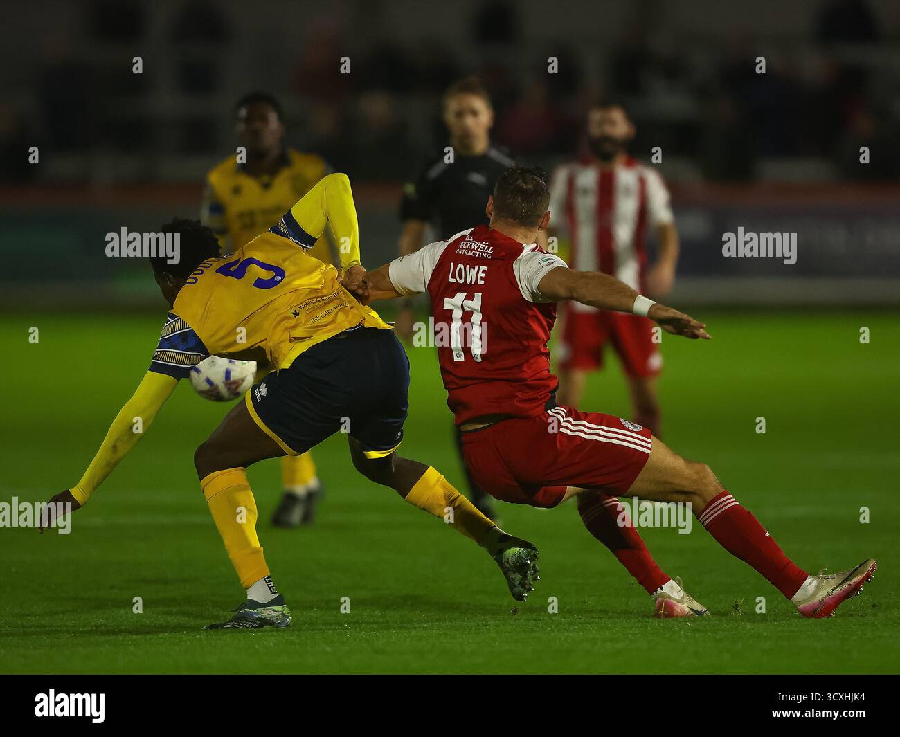 BRACKLEY, ENGLAND - OCTOBER 14: Matt Lowe of Brackley Town is turned by ...