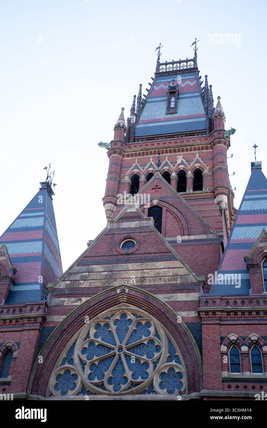 The upper tower of Harvard University’s Memorial Hall displays ...