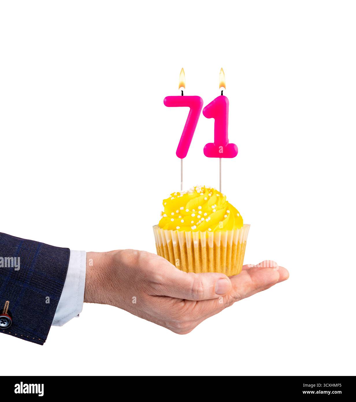 Hand handing a cupcake with a number 71 candle - Birthday on a white ...