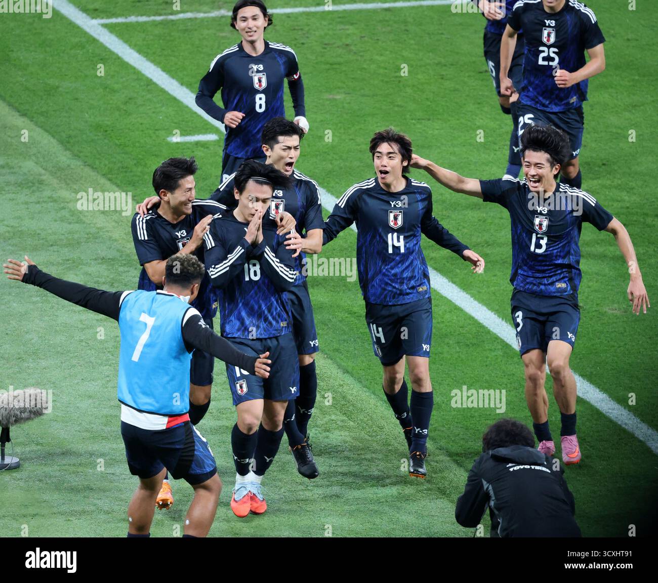 Ayase Ueda of Japan (second from left, 18) celebrates with his ...