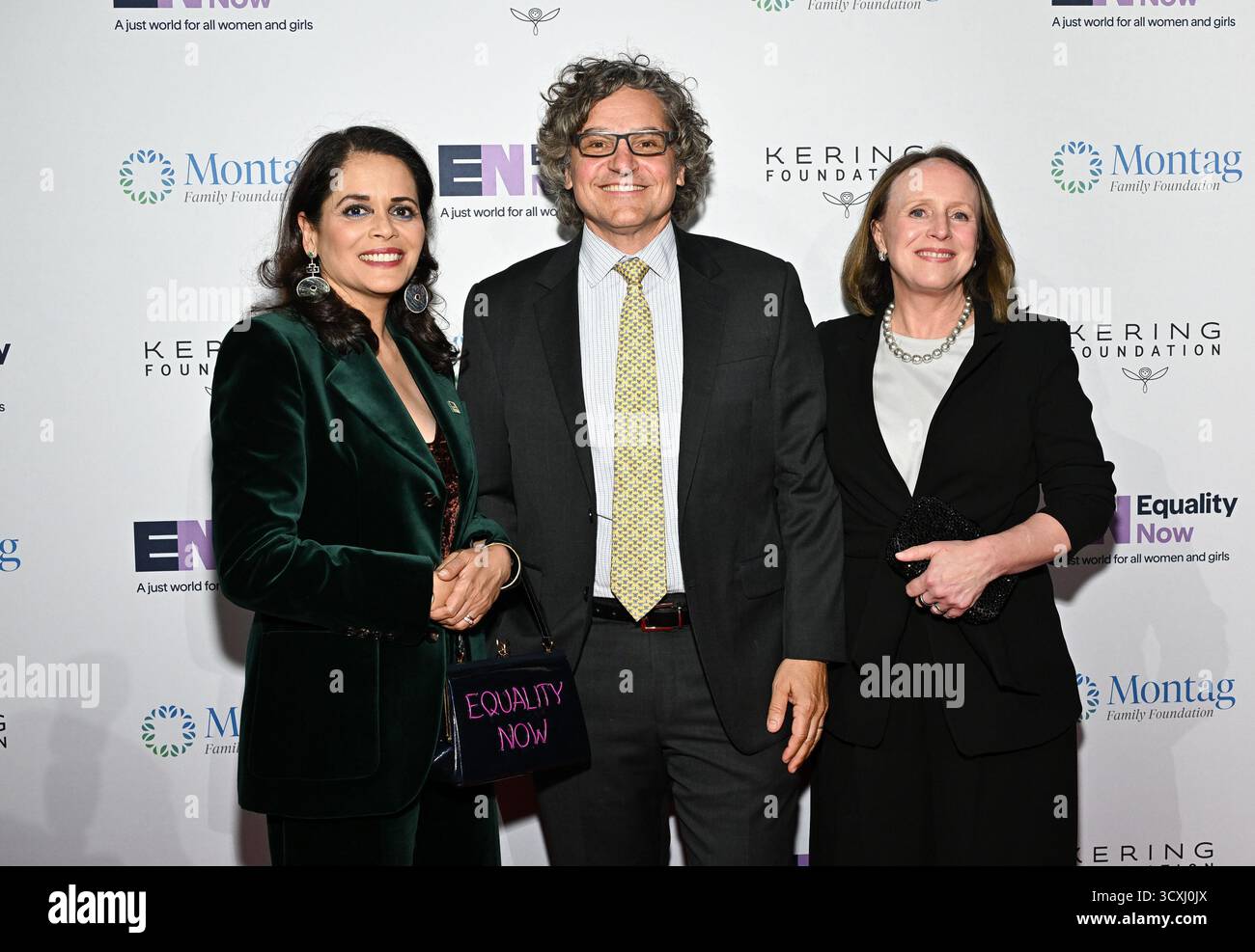 Equality Now executive director S. Mona Sinha, left, Jonathan Soros and ...