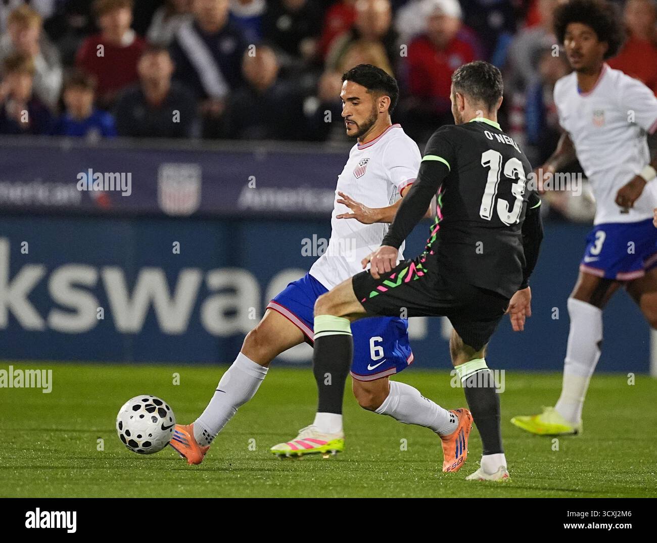 United States midfielder Christian Roldan, back, passes the ball as ...
