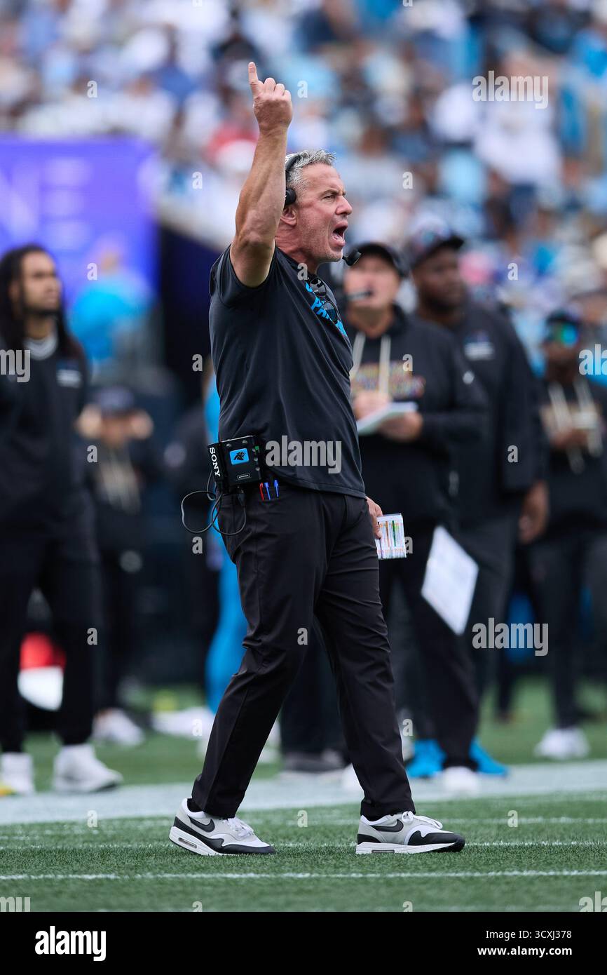 Carolina Panthers tight ends coach Pat McPherson signals to his team ...