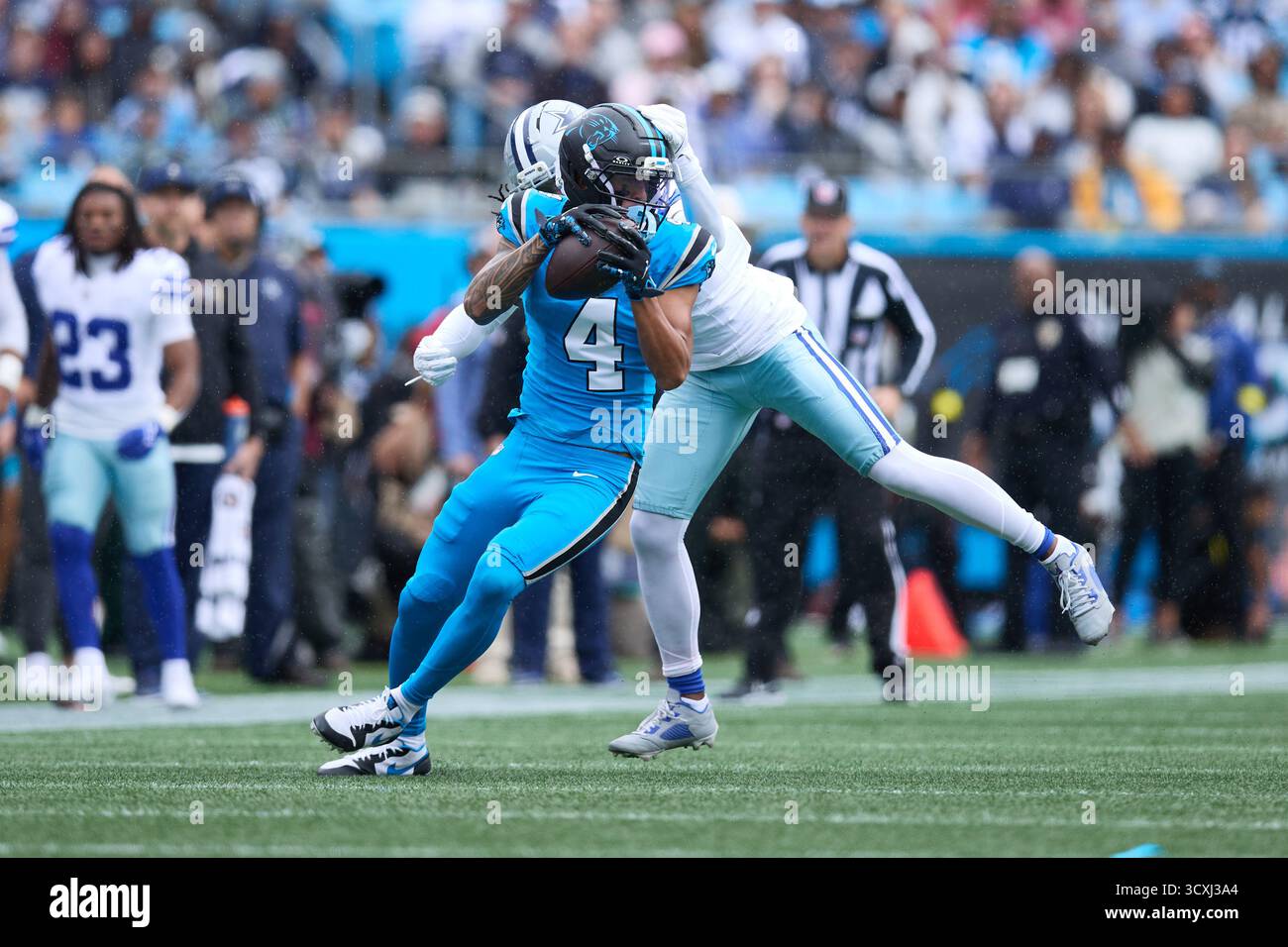 Carolina Panthers wide receiver Tetairoa McMillan (4) catches a pass in ...