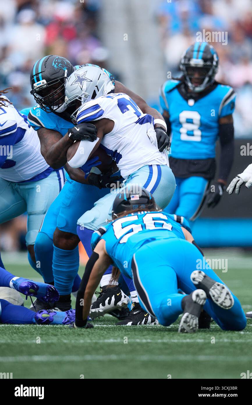 Dallas Cowboys running back Javonte Williams (33) is tackled by ...