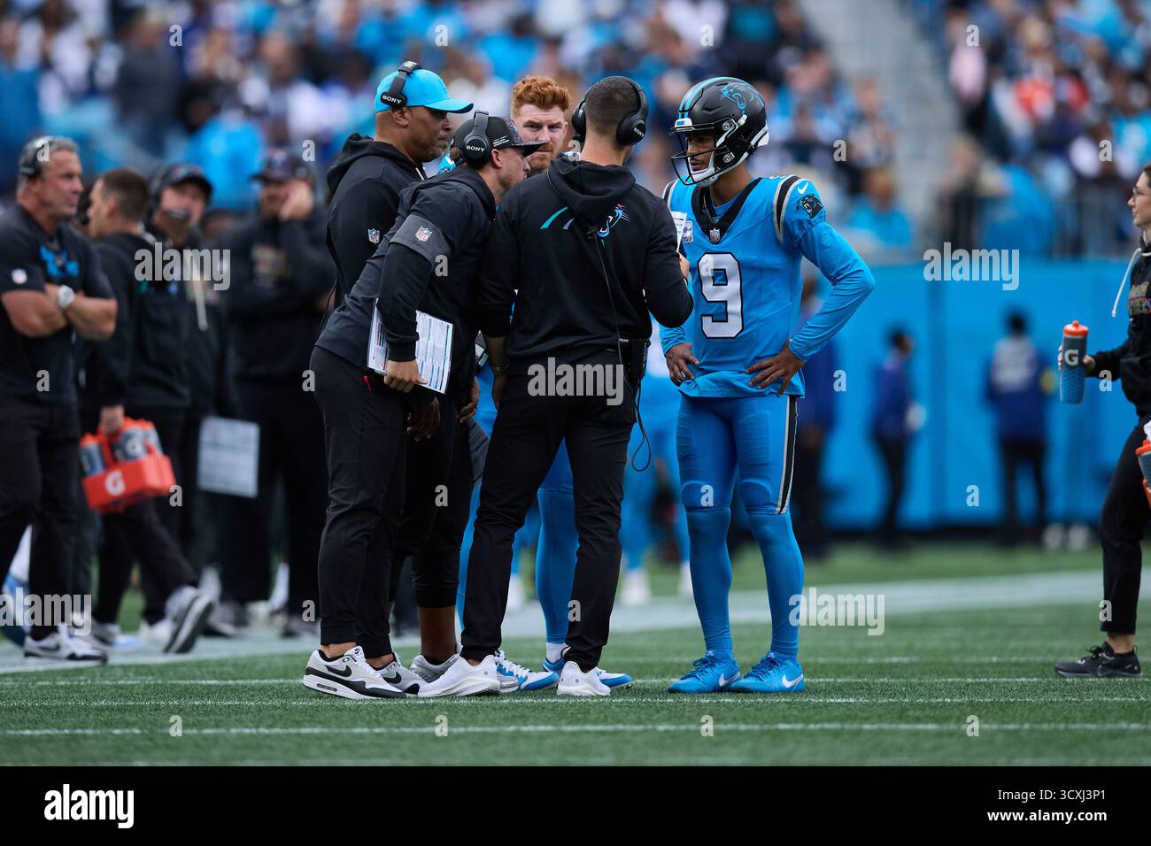 Carolina Panthers quarterback Bryce Young (9) listens to offensive ...