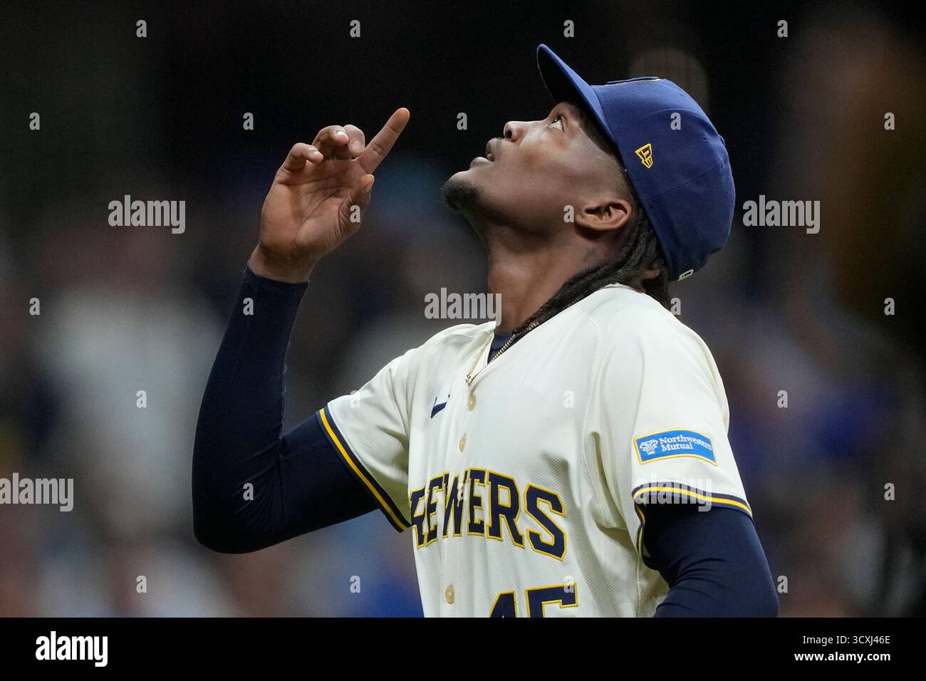 Milwaukee Brewers pitcher Abner Uribe walks to the dugout after the top ...