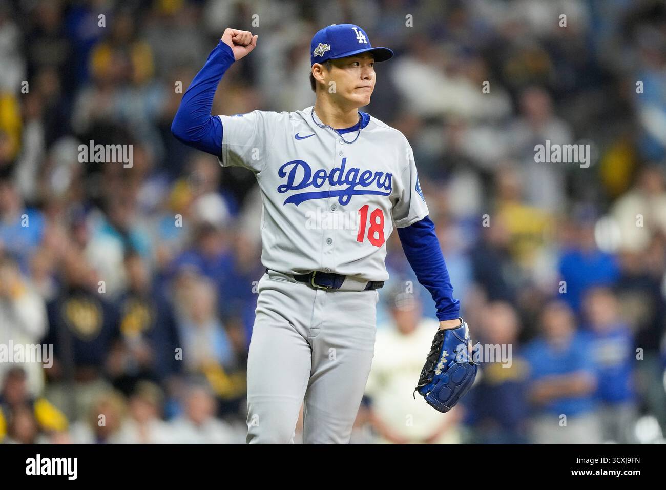 Los Angeles Dodgers pitcher Yoshinobu Yamamoto celebrates throwing a ...