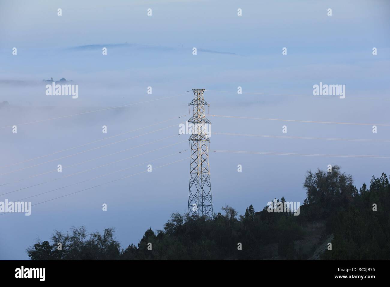 DINGXI, CHINA - OCTOBER 15, 2025 - The morning mist landscape captured ...