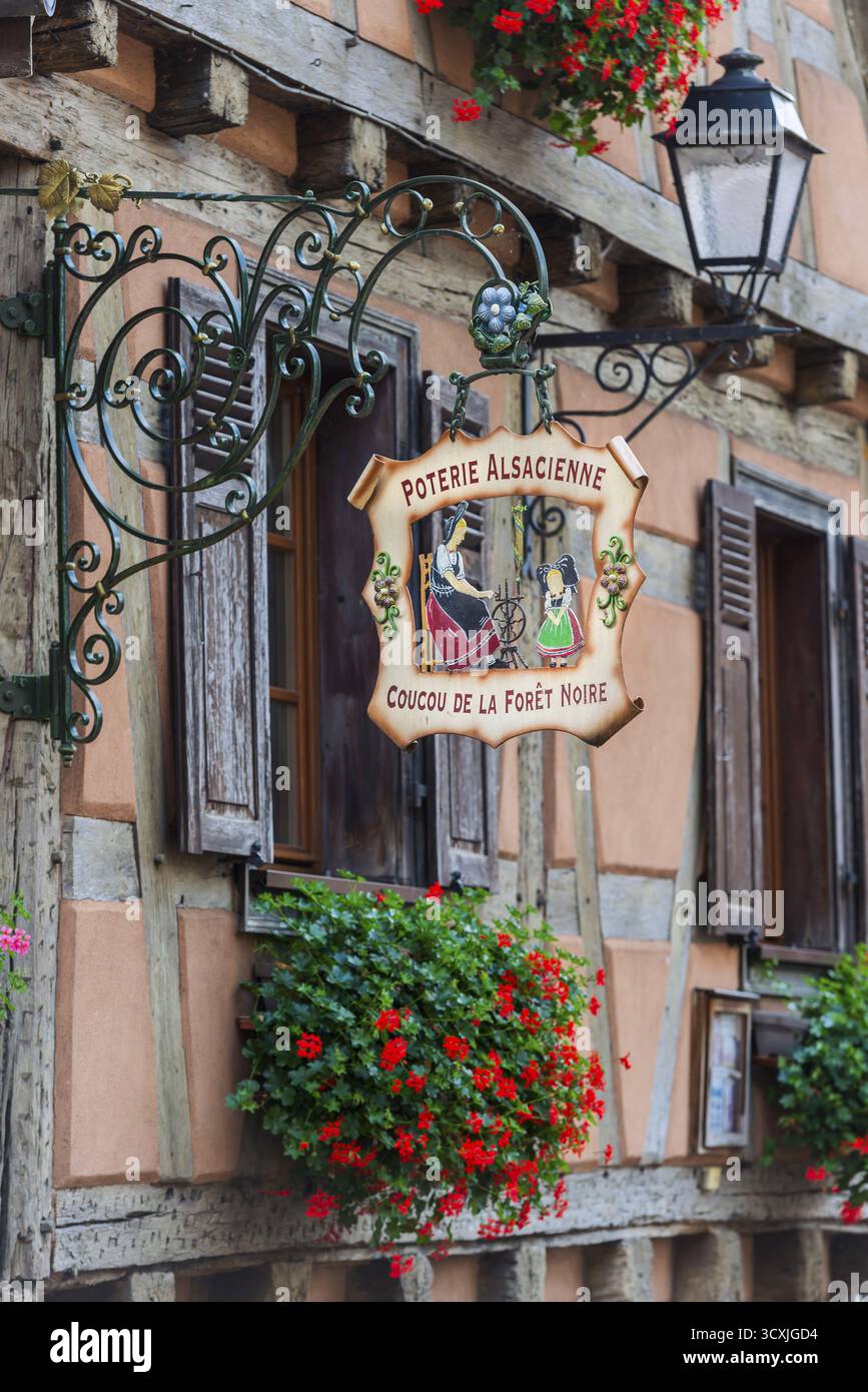 Historic guild sign of a clothing shop in the old town centre of ...