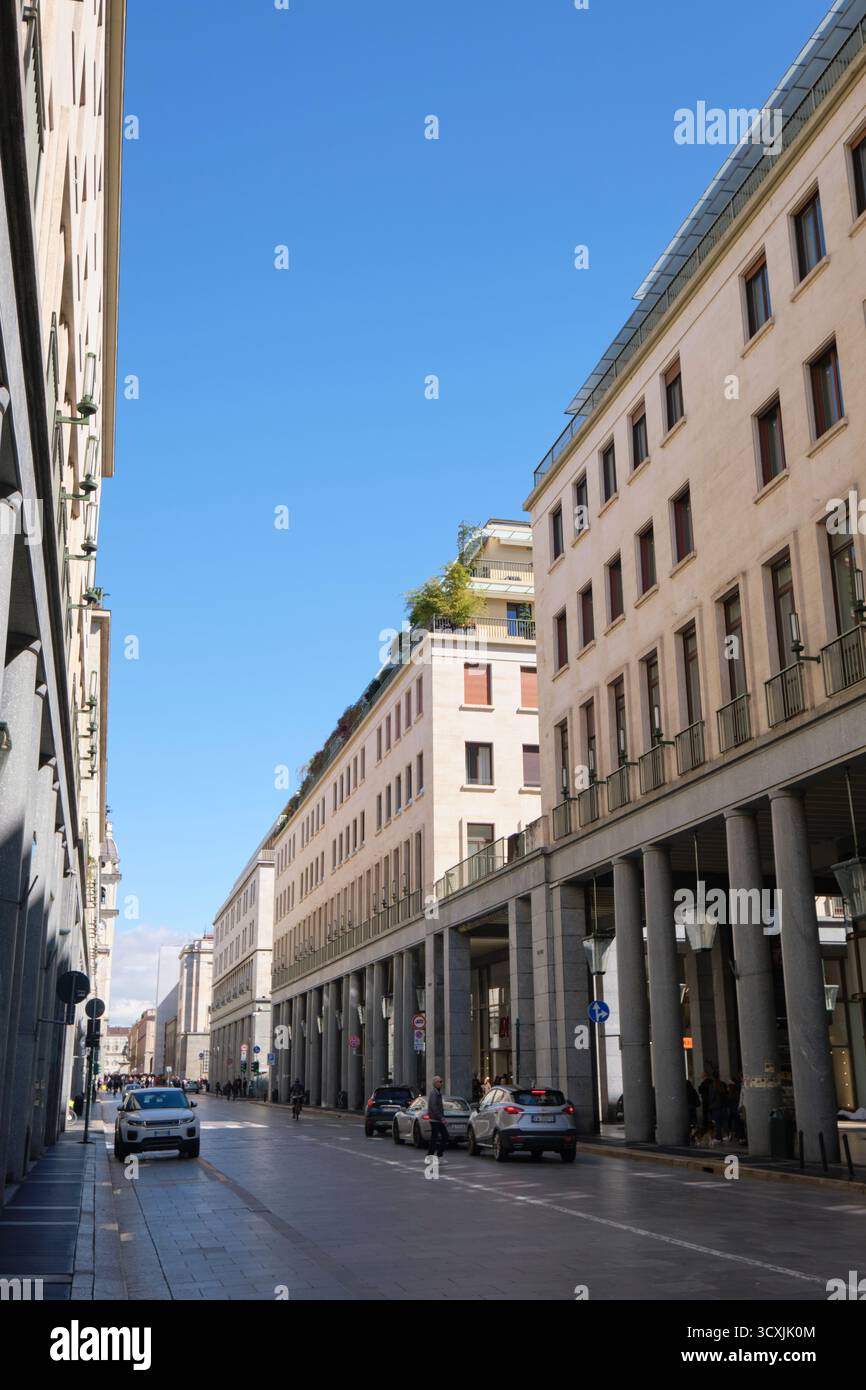 Looking up central Via Roma street, road and the historic buildings. A ...