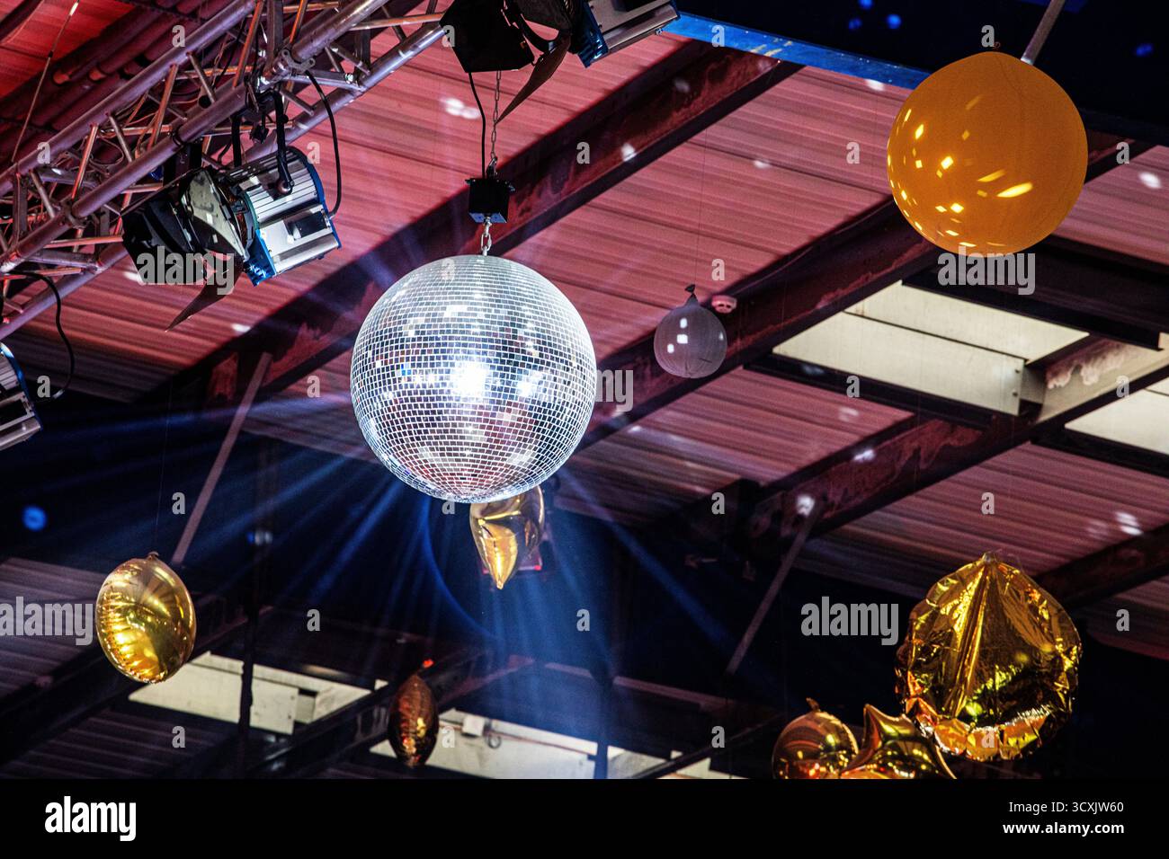Festive and formal decoration of the ceiling with spotlights and ...