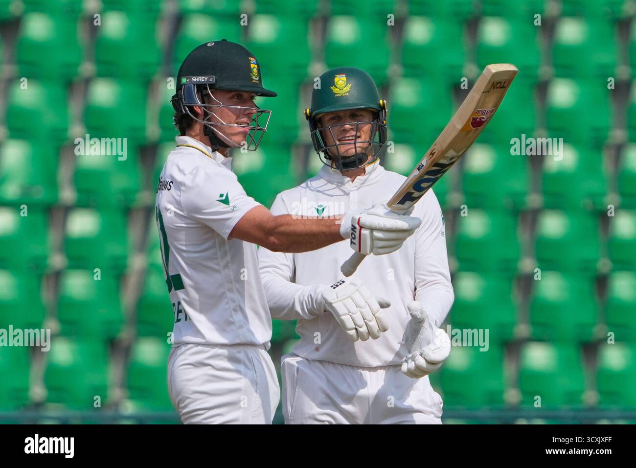 South Africa's Dewald Brevis, left, celebrates after scoring fifty as ...