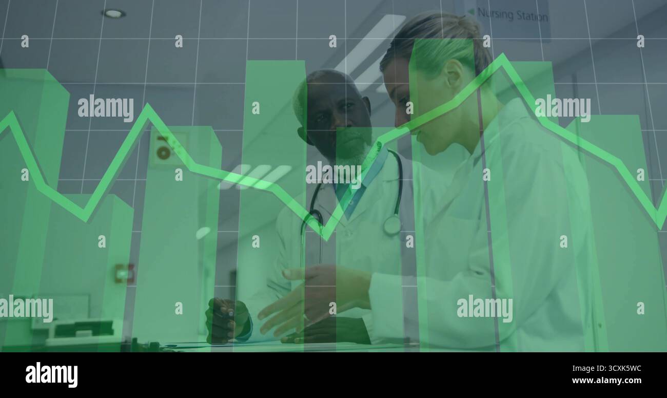 Pointing two doctors with stethoscopes analyzing patient chart at ...