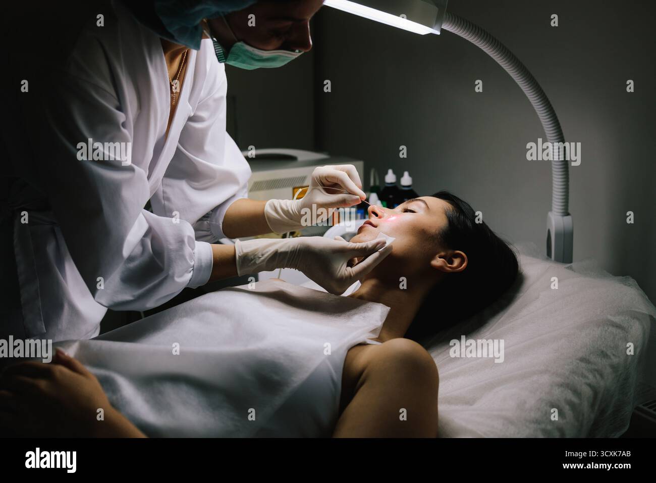 Laser dermatologic treatment for nevus and mole removal. Aesthetic ...
