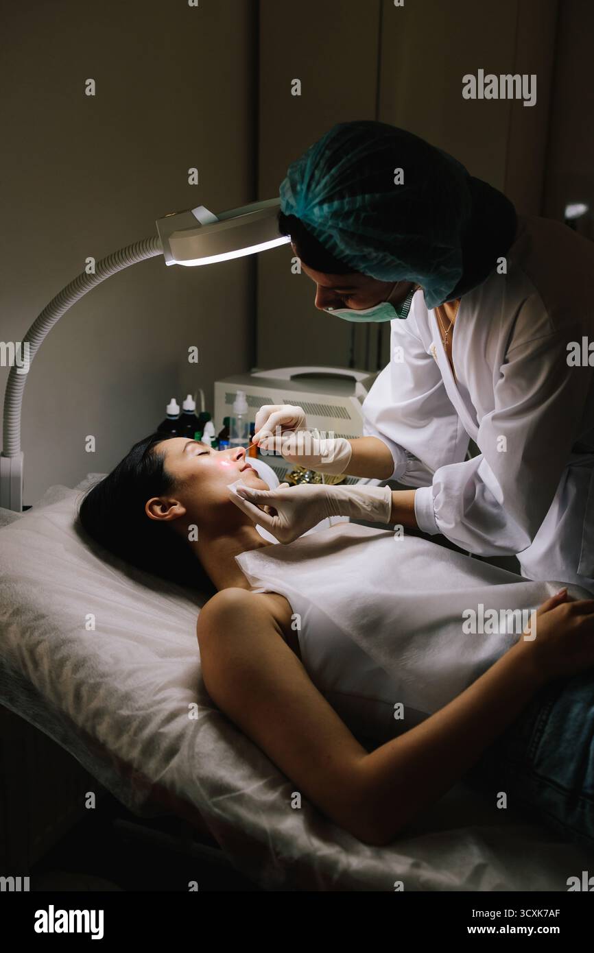 Aesthetic laser removal of nevi and benign growths. Dermatologist ...