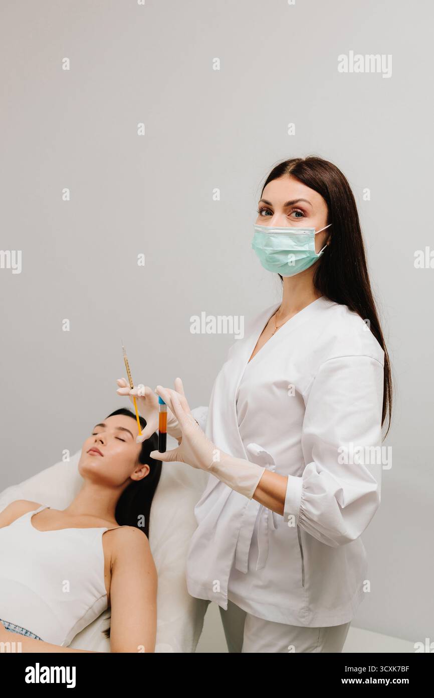 Mesotherapy injection with blood plasma in syringe. Mesotherapy with ...